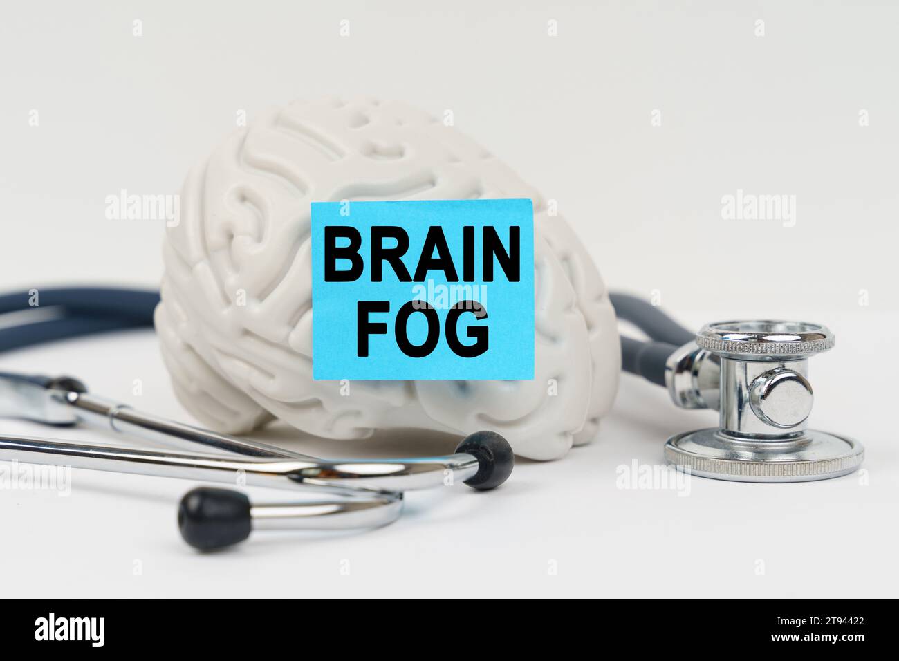 Medical concept. On a white surface next to the stethoscope lies a ...