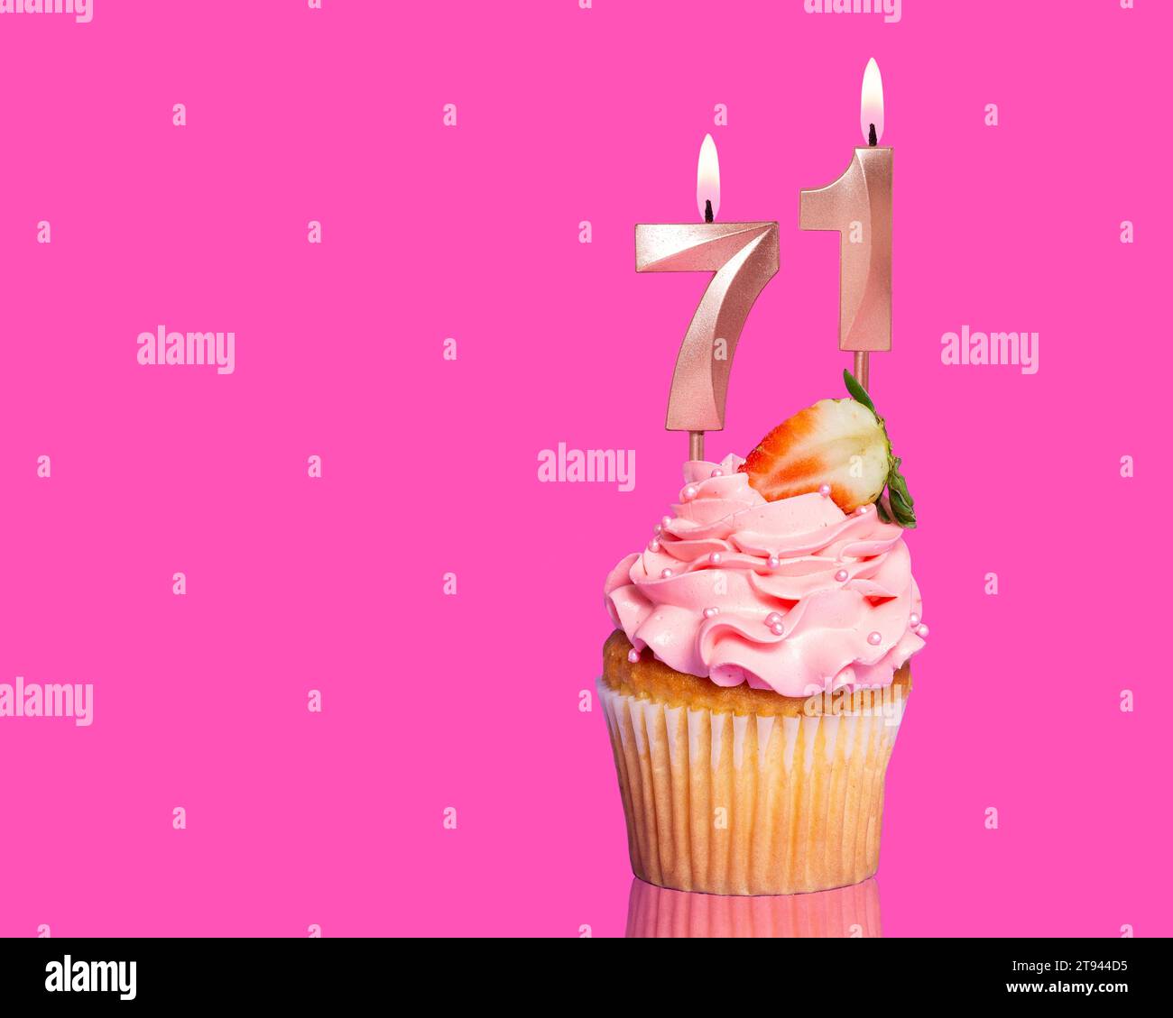 Birthday Cupcake With Candle Number 71 - On Hot Pink Background Stock ...