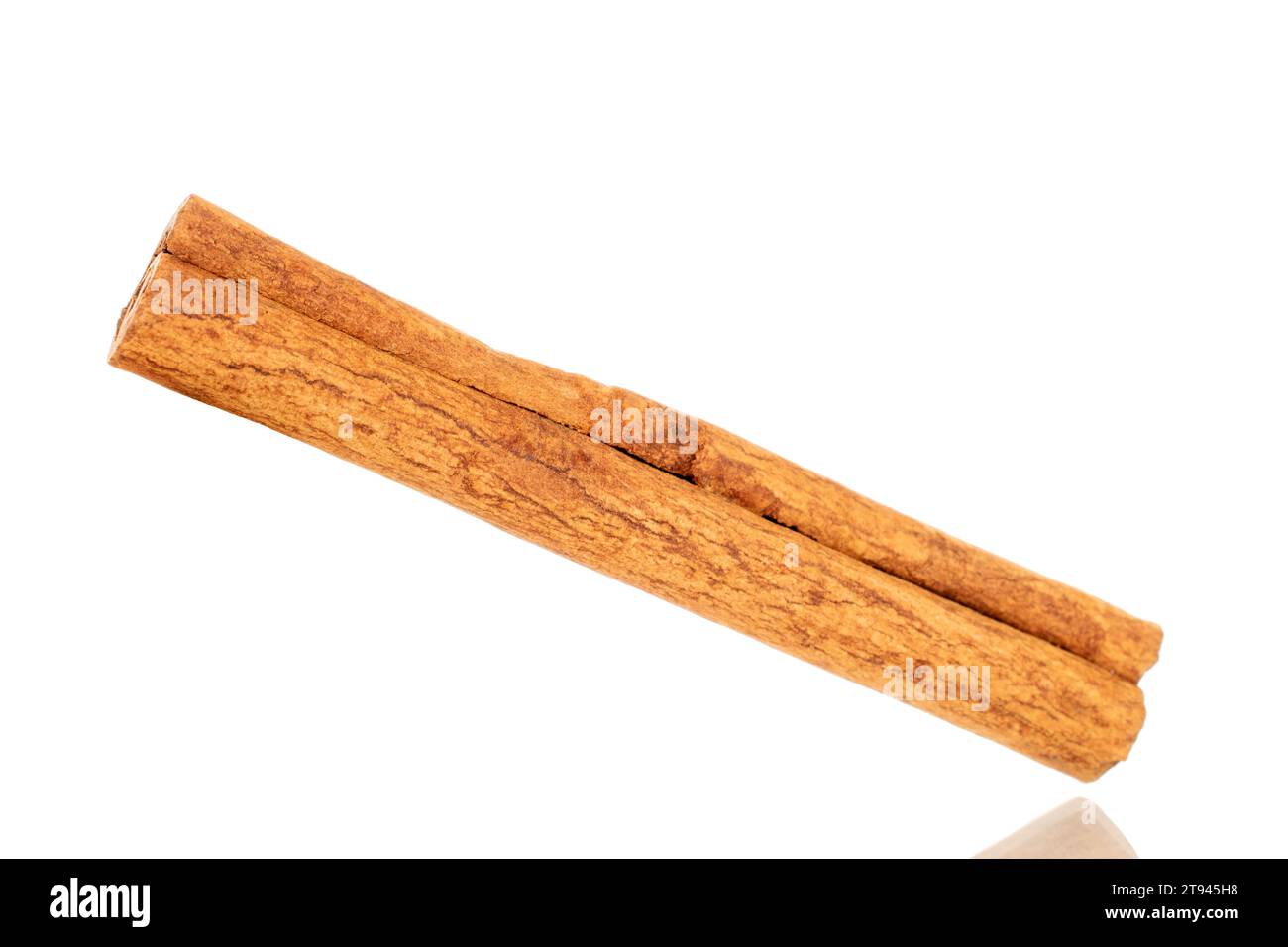 One stick of cinnamon, macro, isolated on white background Stock Photo ...