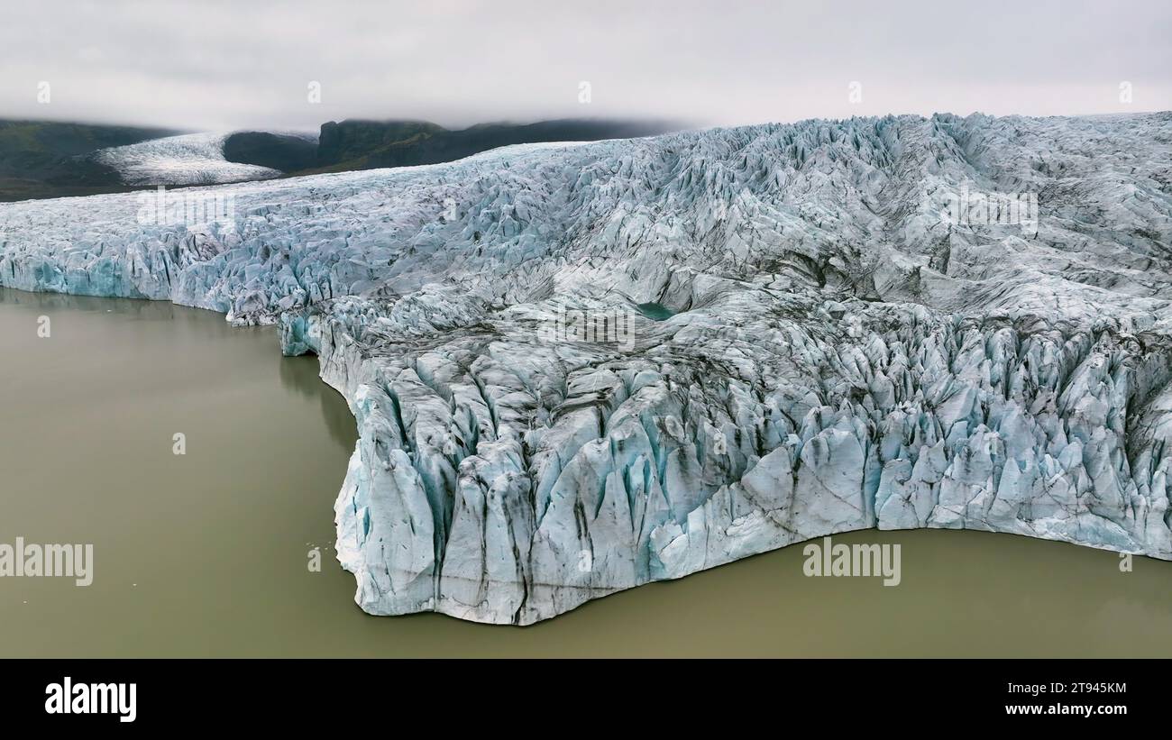 Aerial view of white glacier. Epic Drone Shot iceberg Stock Photo - Alamy