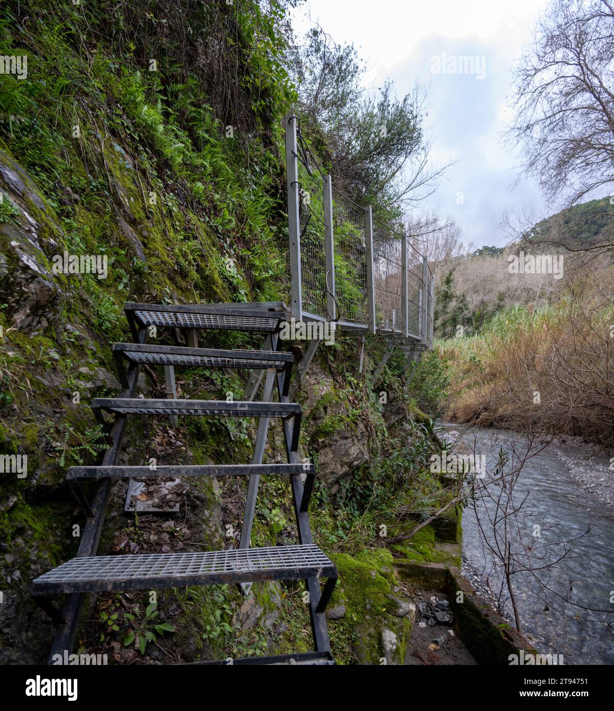 A metal pathway built alongside a cliff from the Pasarelas del Rio ...