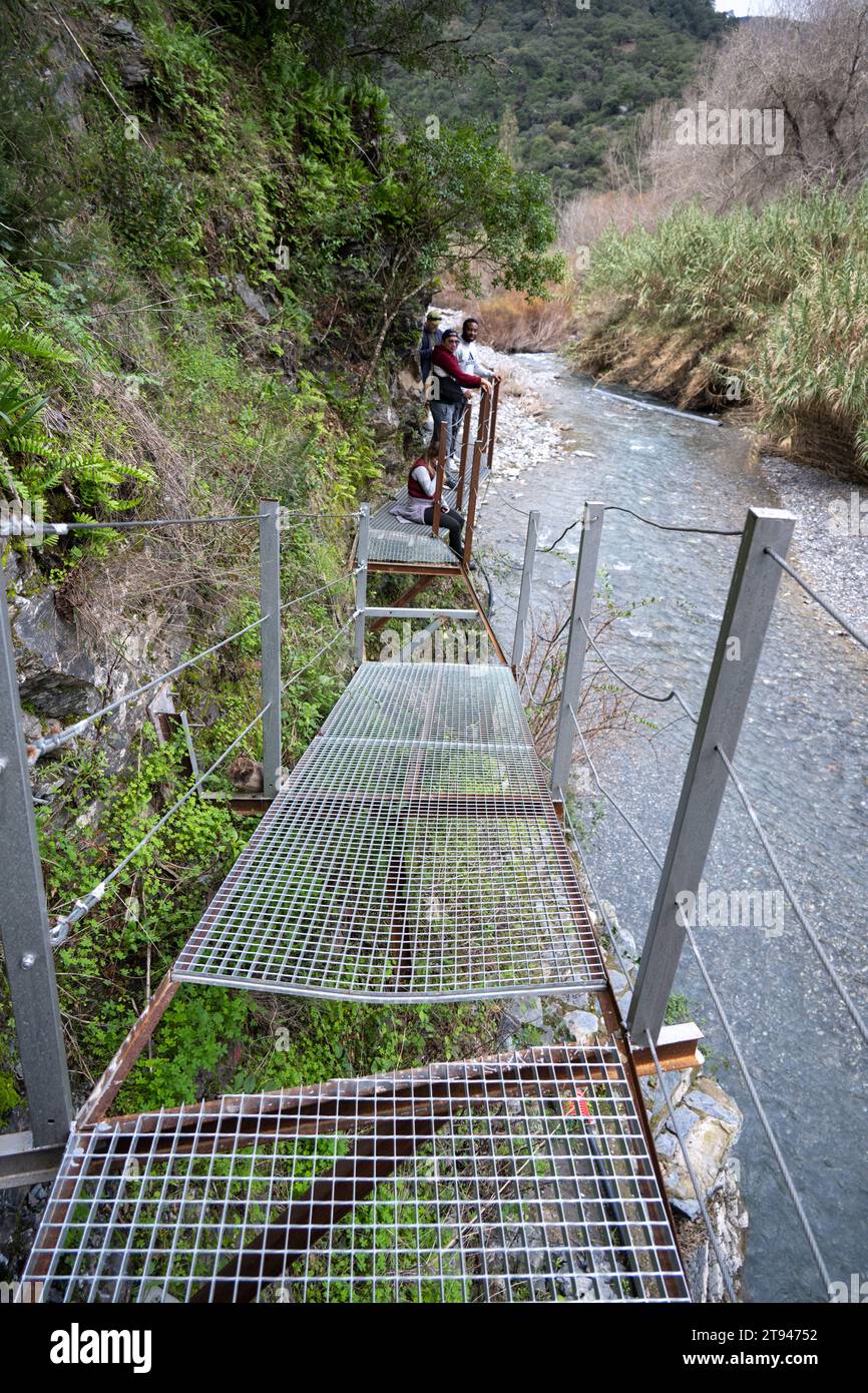 A metal pathway built alongside a cliff from the Pasarelas del Rio ...
