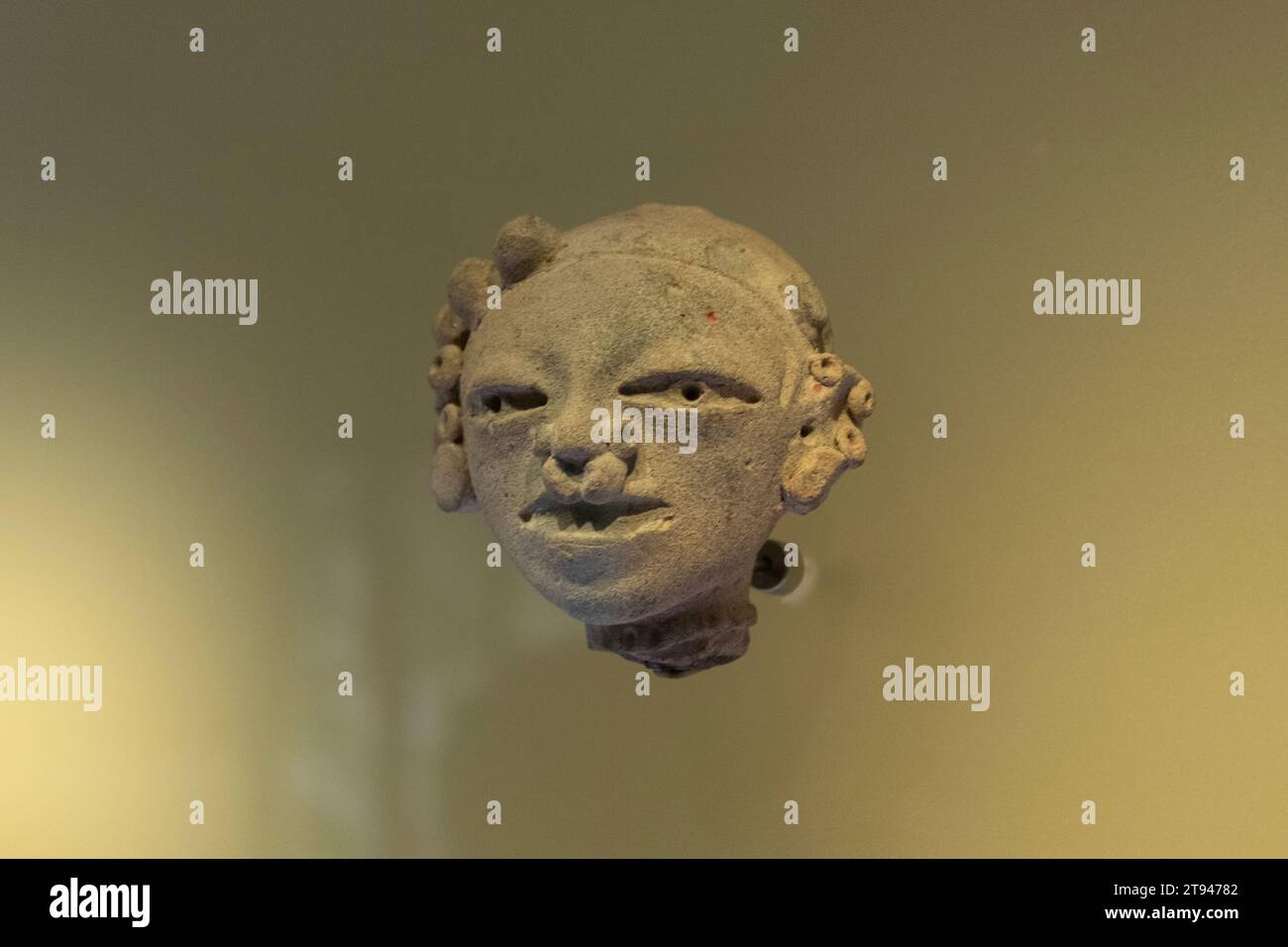 Ancient tumaco ceramic head with anthropomorphic form at golden museum ...