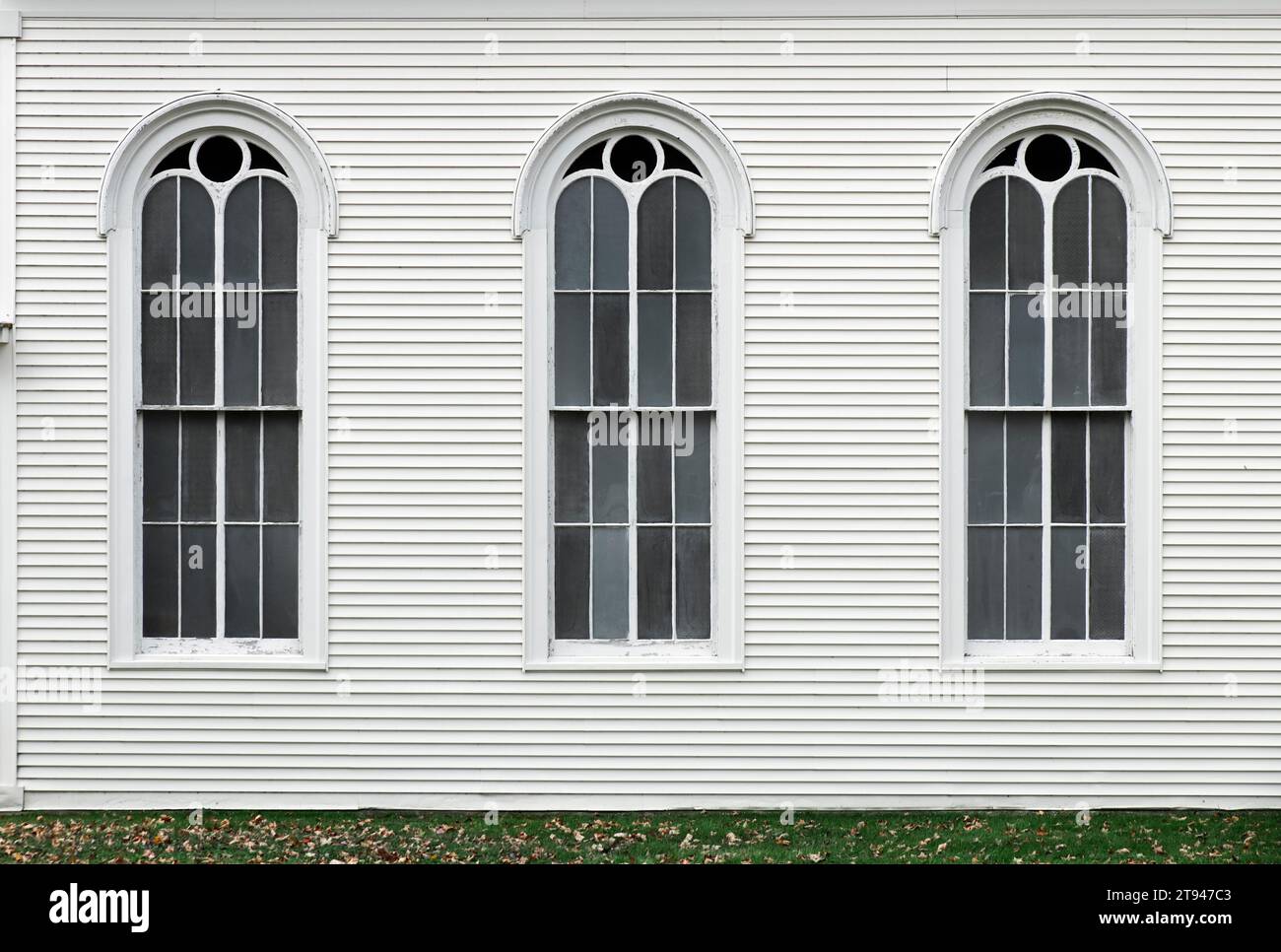 Simple wooden church with arched windows Stock Photo - Alamy
