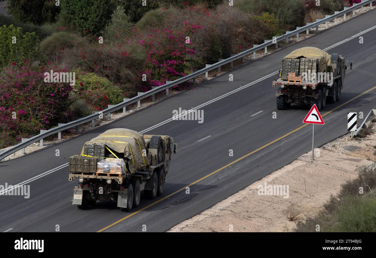 Southern Israel, Israel. 22nd Nov, 2023. Israeli IDF trucks carry ...