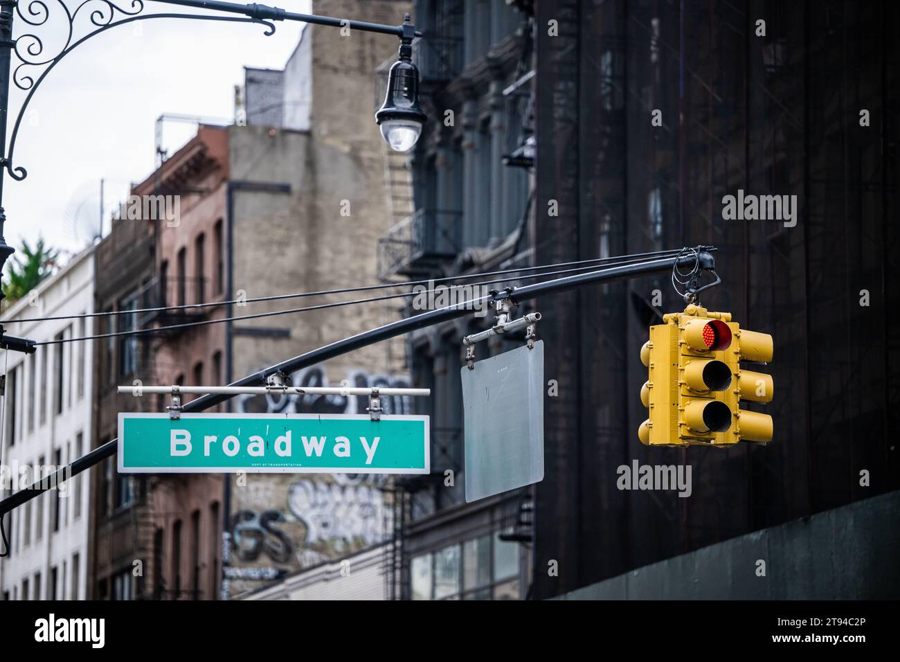 Broadway sign next to traffic lights on the streets of New York Stock ...