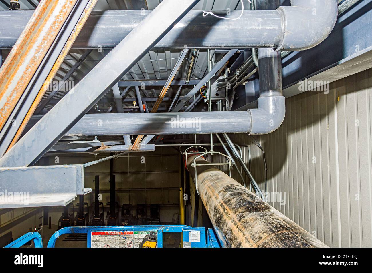Pipes and brackets near the ceiling in the freezer of a cold-storage ...