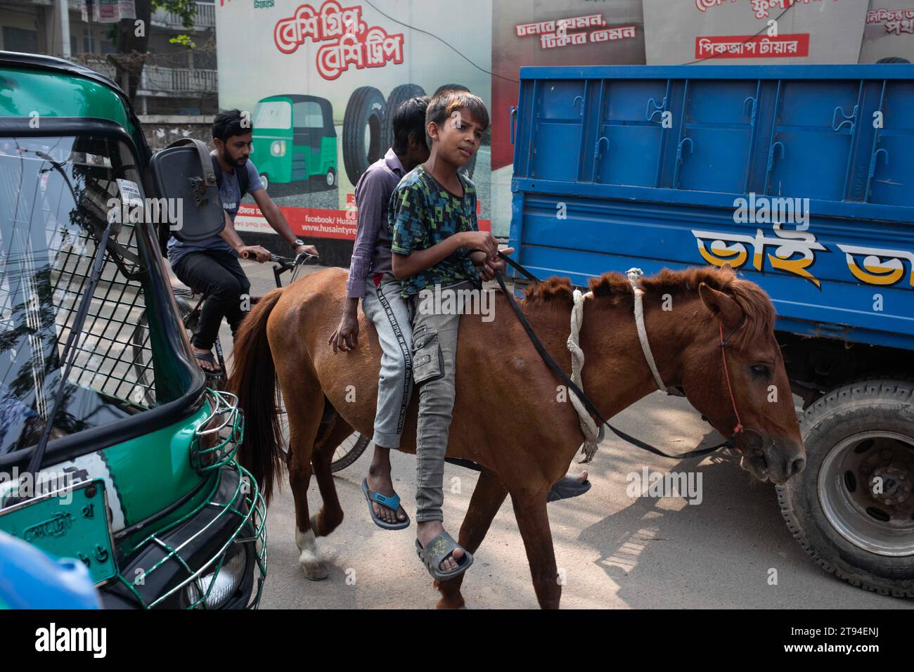 Two boys riding horse in hi-res stock photography and images - Alamy