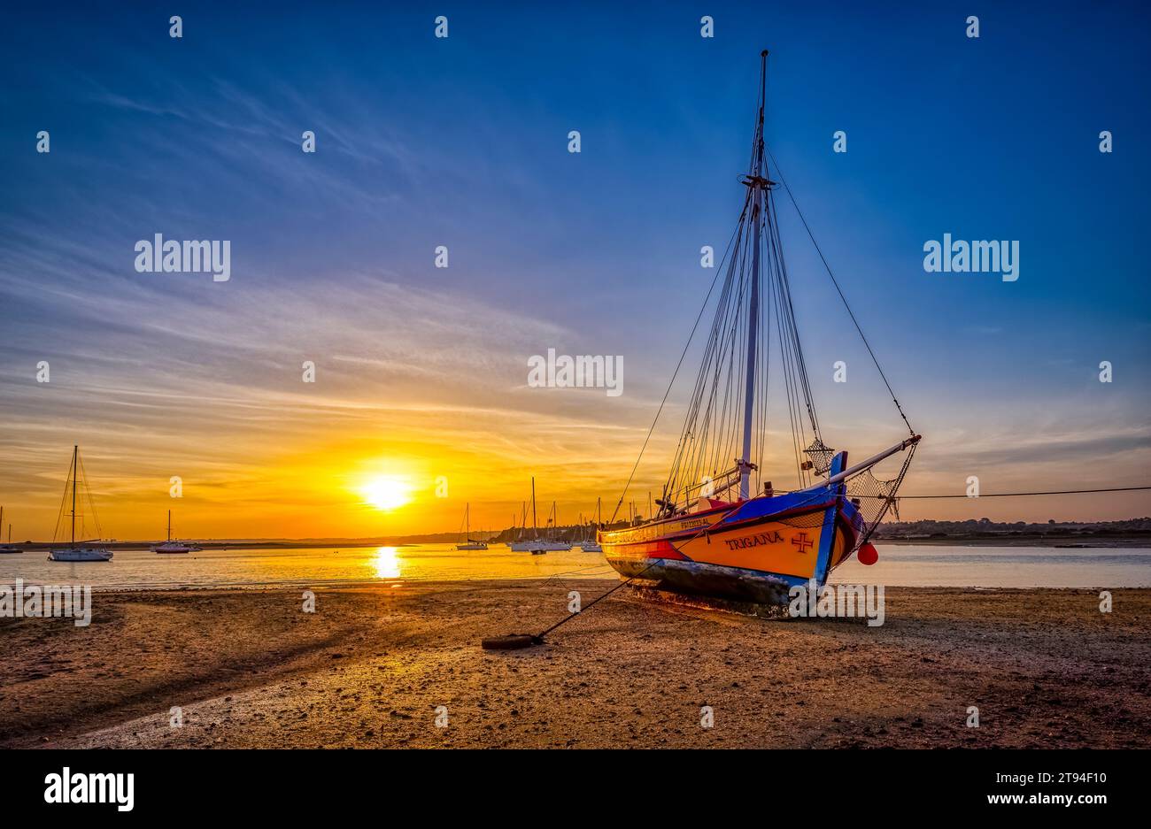 Sunset on beach in alvor hi-res stock photography and images - Alamy