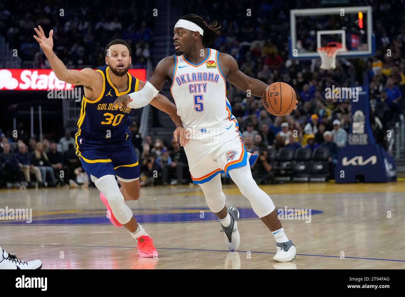 Oklahoma City Thunder guard Luguentz Dort (5) drives to the basket ...