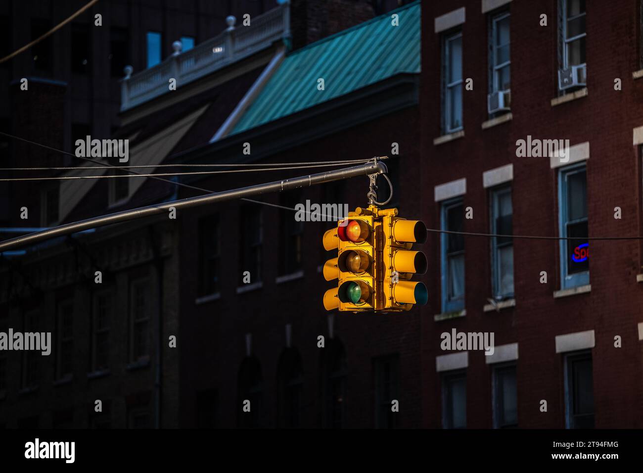 Traffic light hanging on Brooklyn streets Stock Photo - Alamy