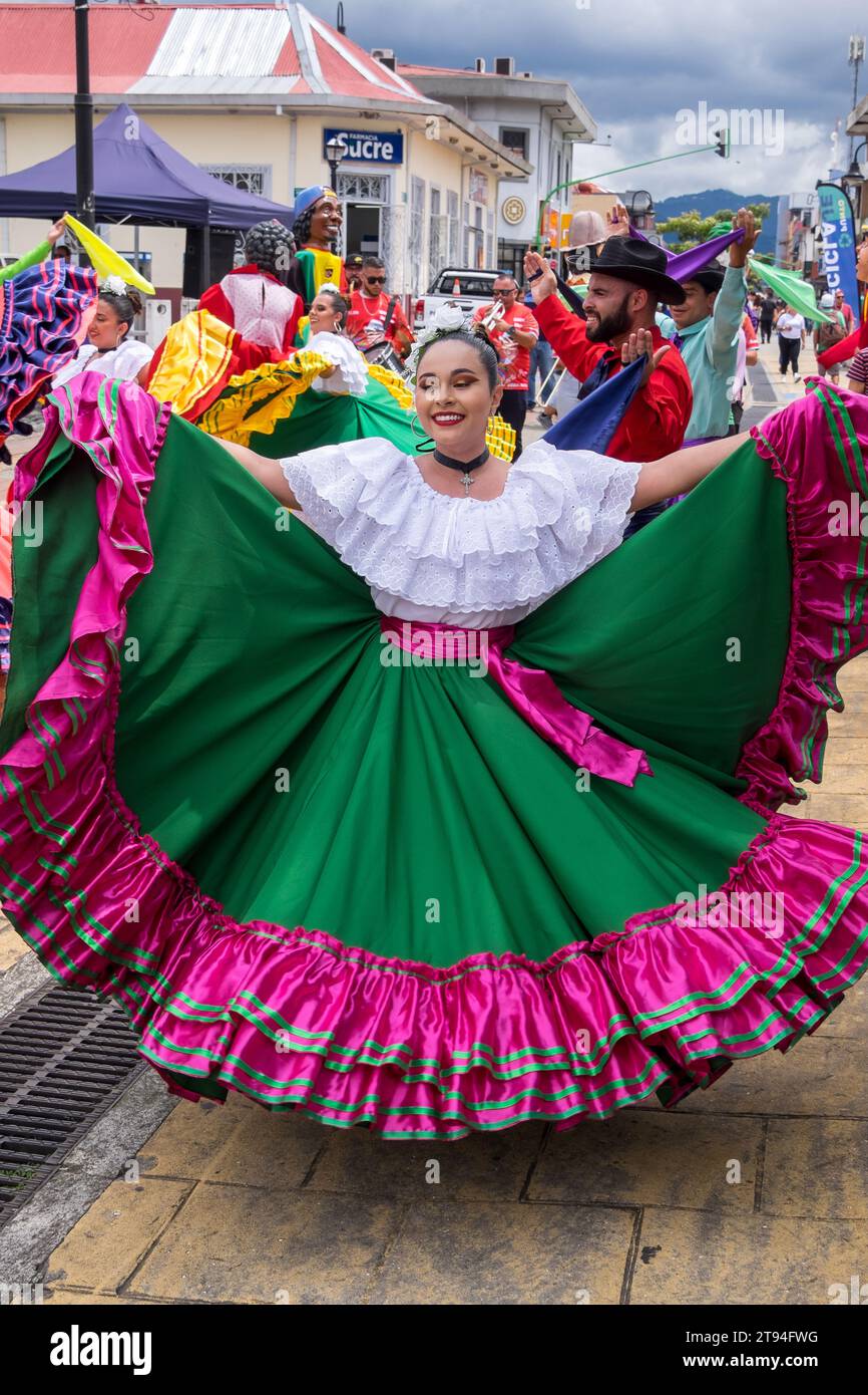 Woman in typical costume dancing in a folk group in the city of San ...