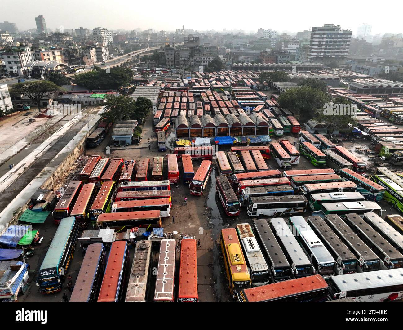 Long-route buses remain parked inside the Sayedabad Intercity Bus ...