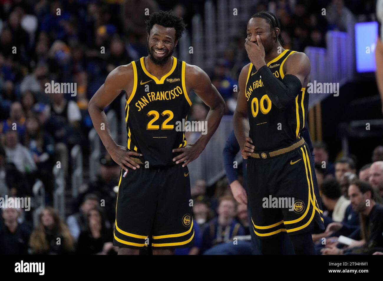 Golden State Warriors forward Andrew Wiggins (22) and forward Jonathan ...