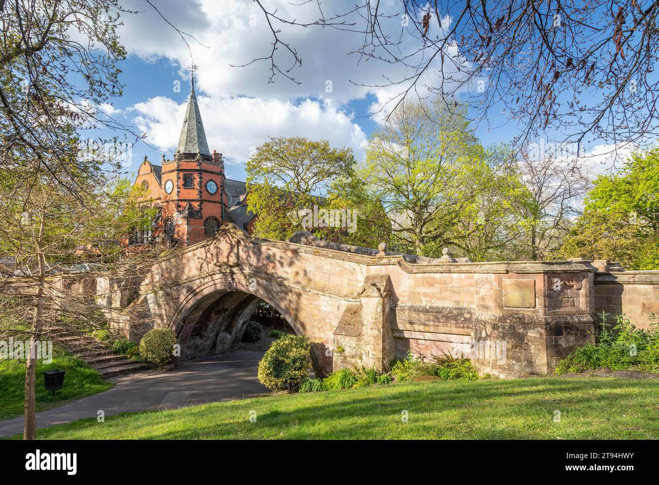 The Dell Bridge, Port Sunlight, in spring with the Lyceum building ...