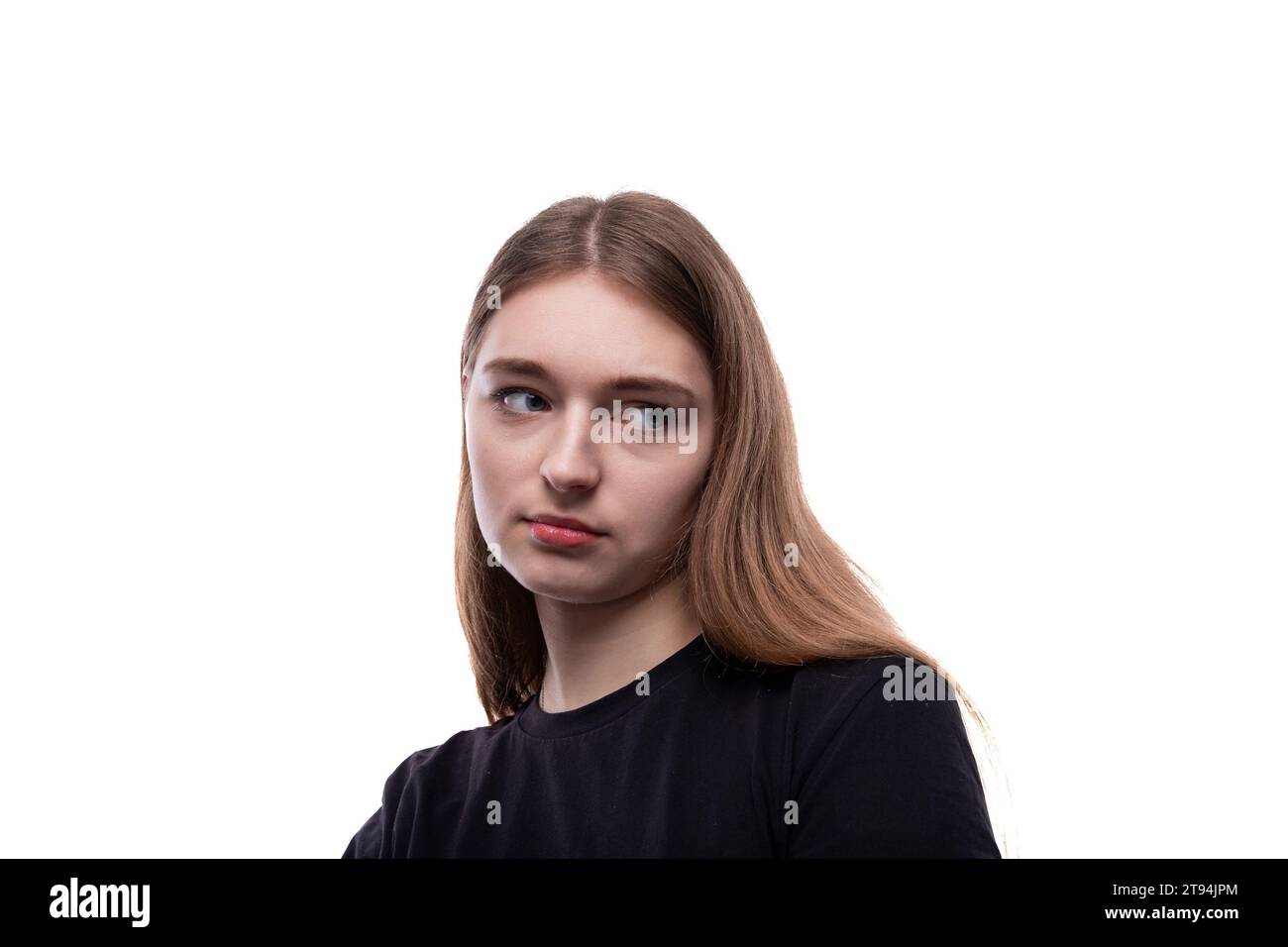 Close-up portrait of a Caucasian 15 year old girl with brown hair on a ...