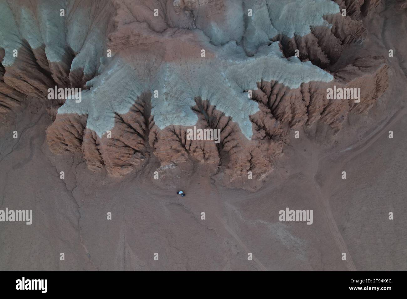 A breathtaking aerial view of a desert valley landscape, featuring a ...