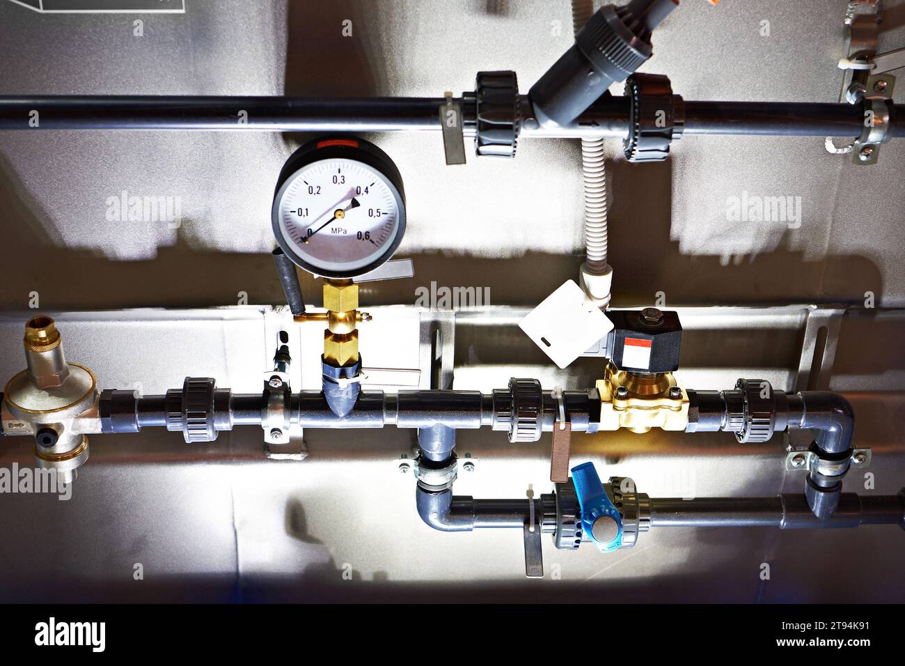 Installation of plastic pipes for water pipelines and pressure gauge ...