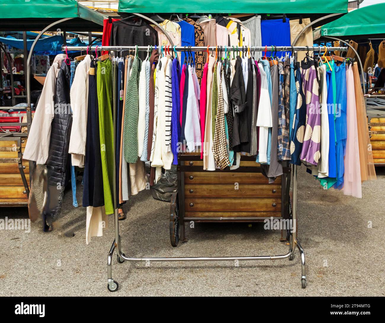 Second hand female clothes sold on flea market outdoors Stock Photo - Alamy