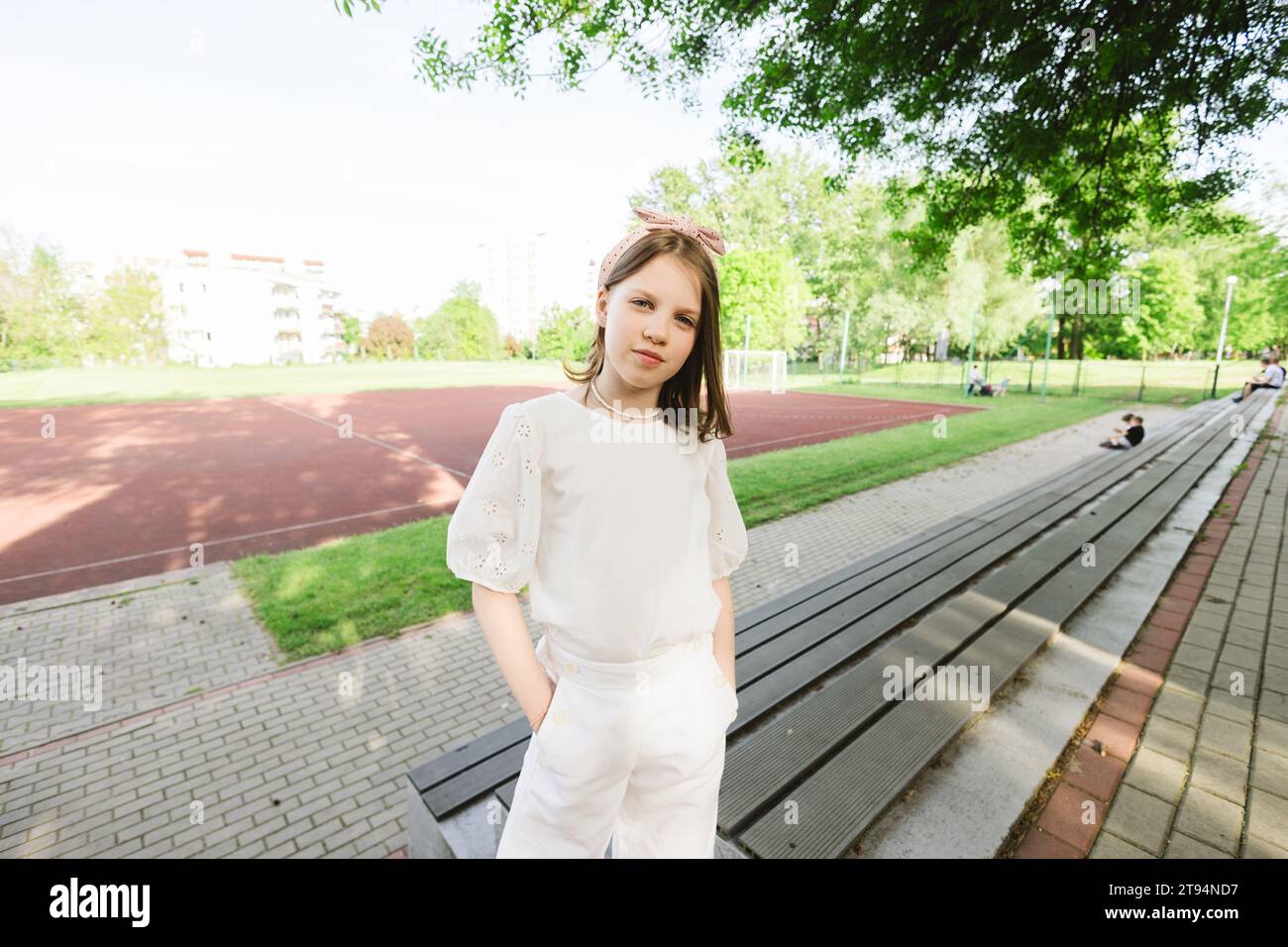 Girl spending time alone at city park in beautiful warm sunny day Stock ...