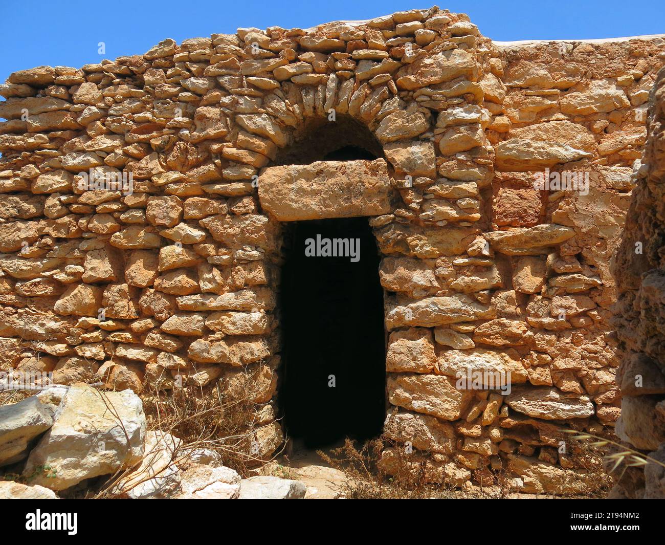 houses built with dry stone walls typical of the warm Mediterranean ...
