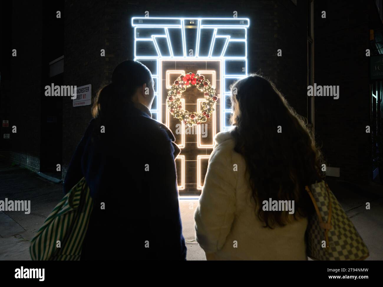 EDITORIAL USE ONLY Members of the public view the new festive three ...