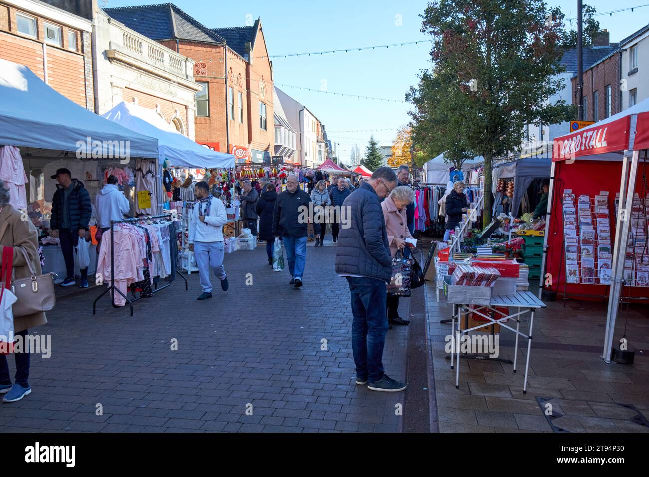 market stalls in winter on a saturday market day in the market town of ...