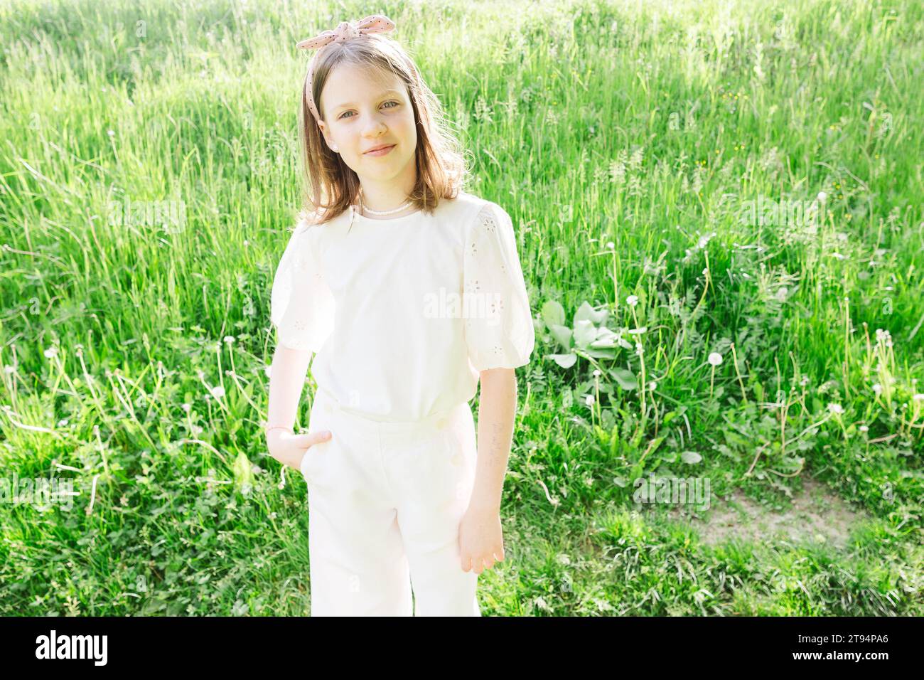 Girl spending time alone at city park in beautiful warm sunny day Stock ...