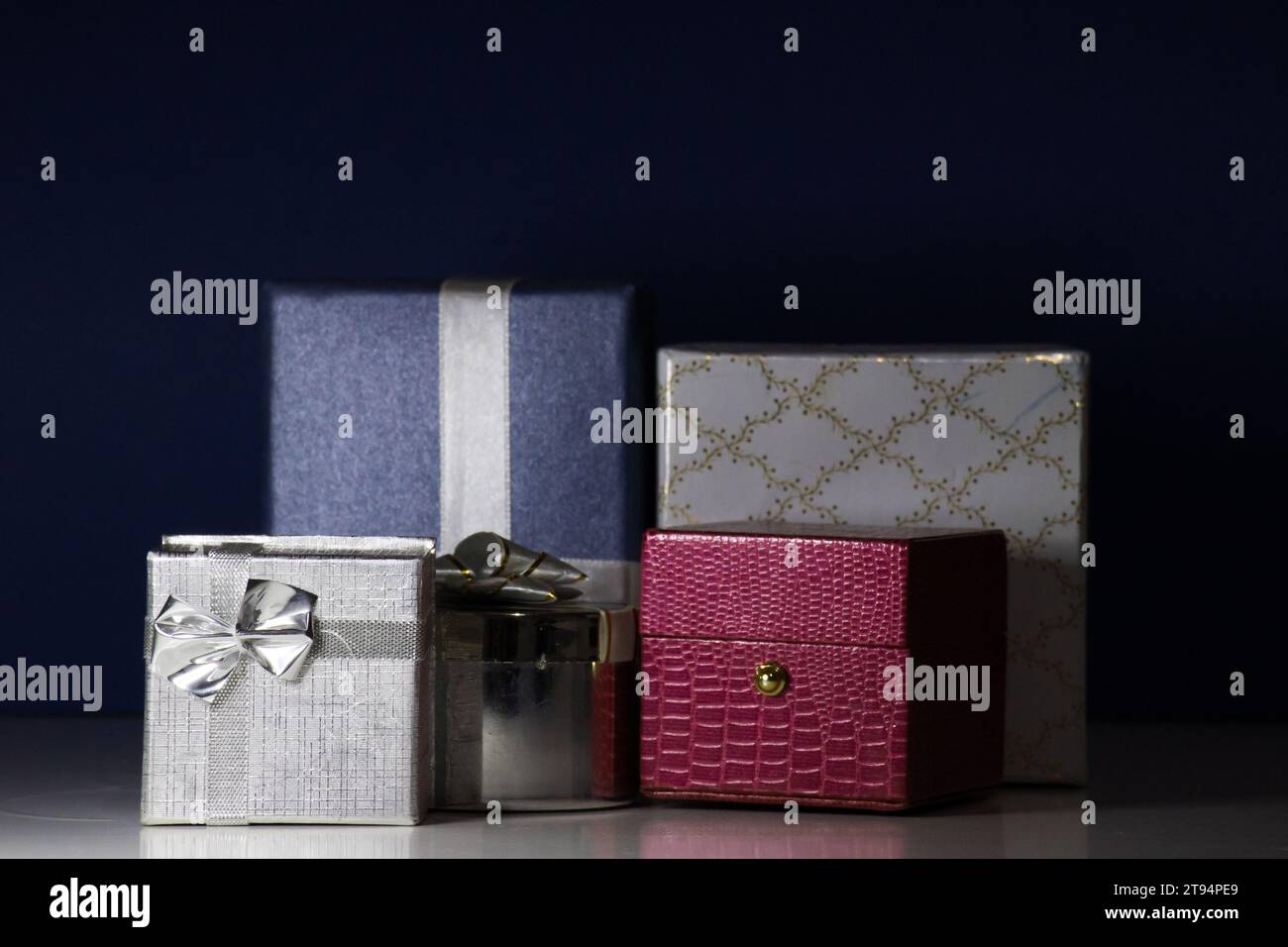 colorful gift boxes of different shapes Stock Photo - Alamy
