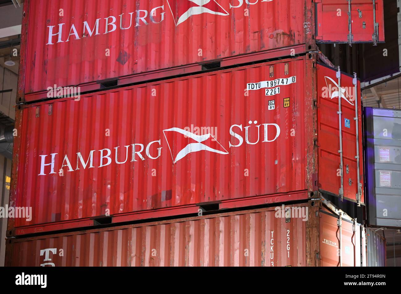 Freight containers stacked in a hall, Hamburg Stock Photo - Alamy