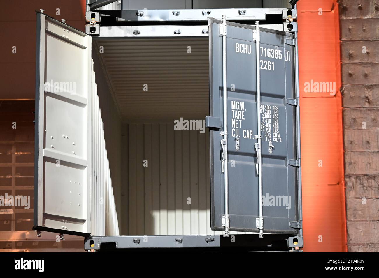 Freight containers stacked in a hall, Hamburg Stock Photo - Alamy