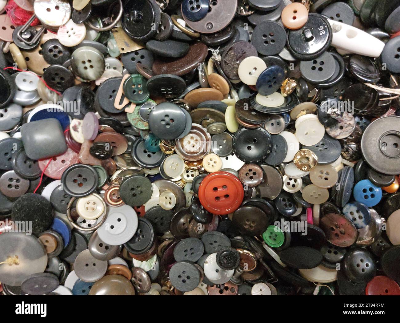 background of many circular and other shaped buttons in the tailoring ...