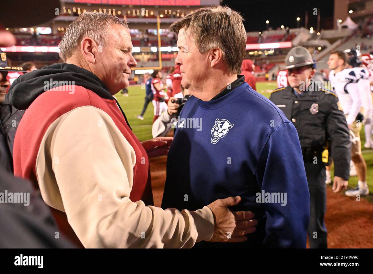 Arkansas coach Sam Pittman shakes hands with Florida International ...