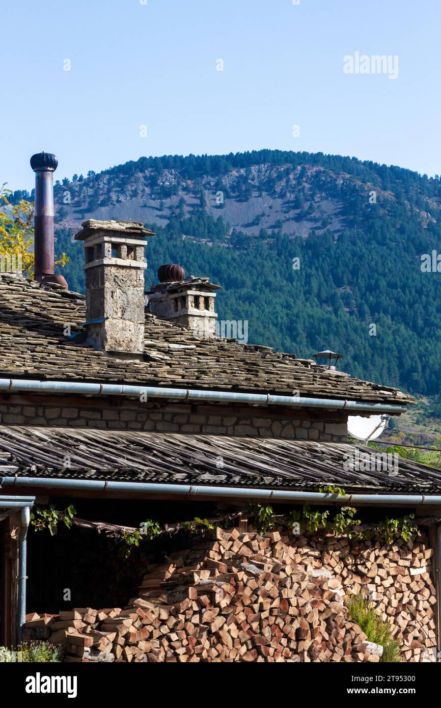 Traditional house with stonelime roof tiles, a local architecture style ...