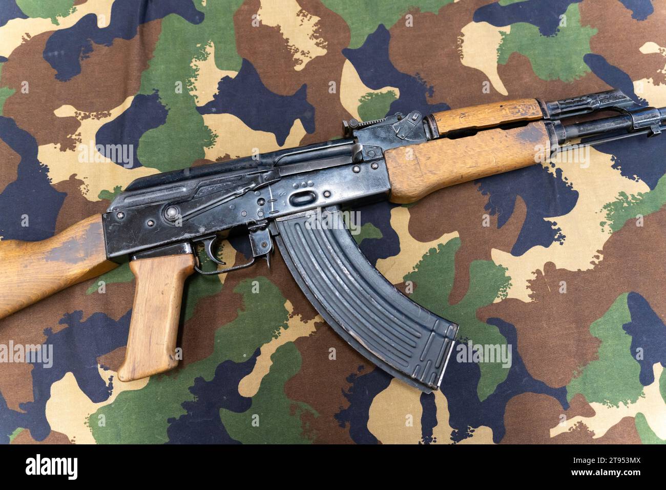 AK-47 Kalashnikov assault rifle on a camouflage tarp Stock Photo - Alamy