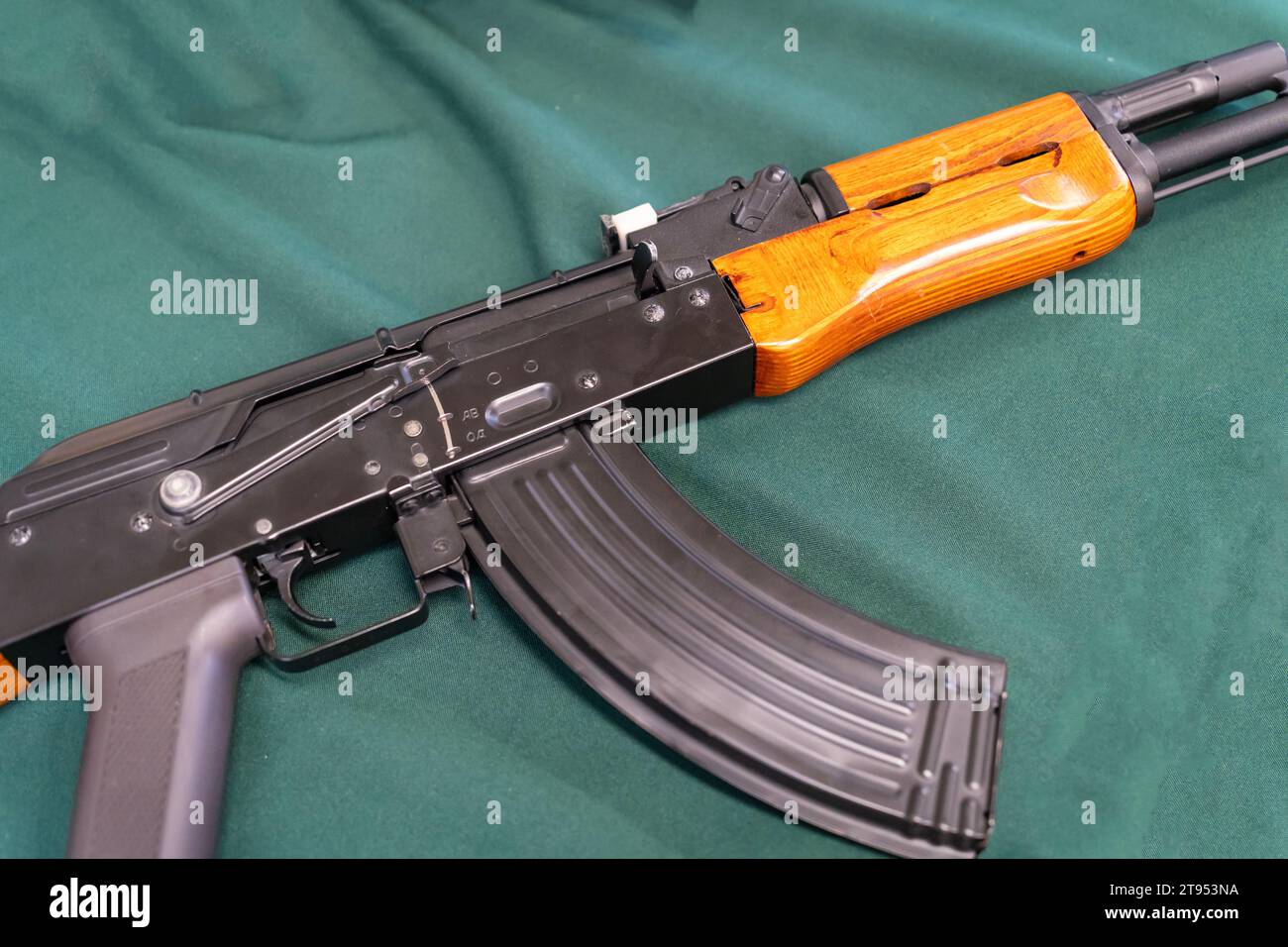 AK-47 Kalashnikov airsoft assault rifle with a green background Stock ...