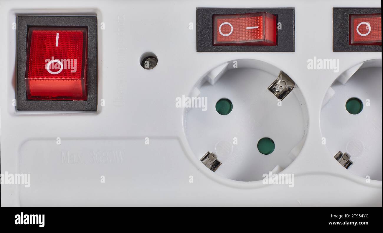 Detail of multi sockets power extension Stock Photo - Alamy