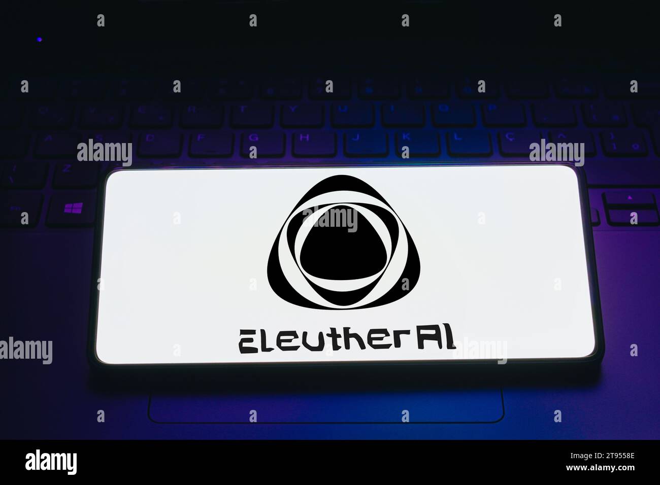 In this photo illustration, the Eleuther AI logo is displayed on a ...