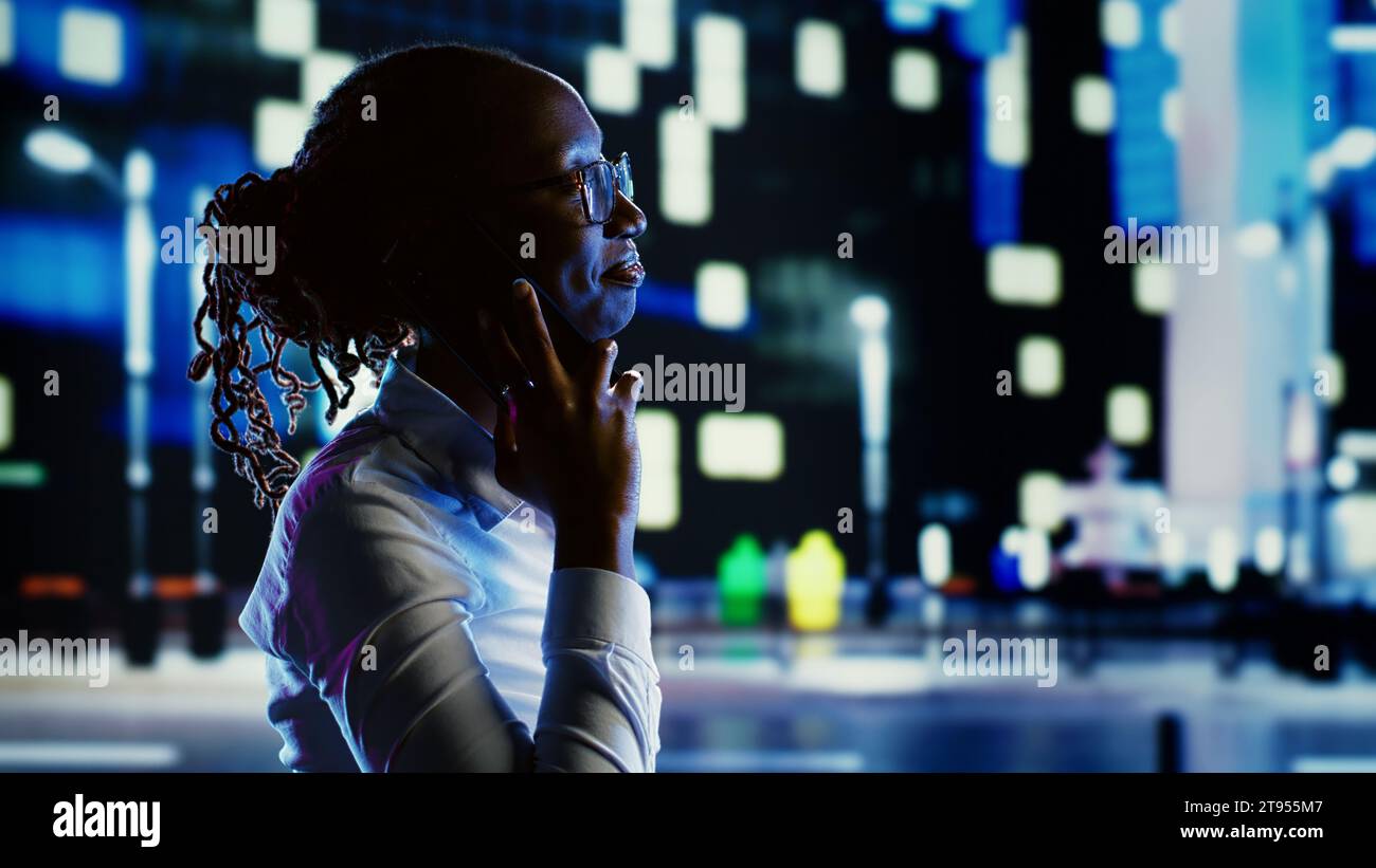 African American Woman Talking Over The Phone With Husband Using