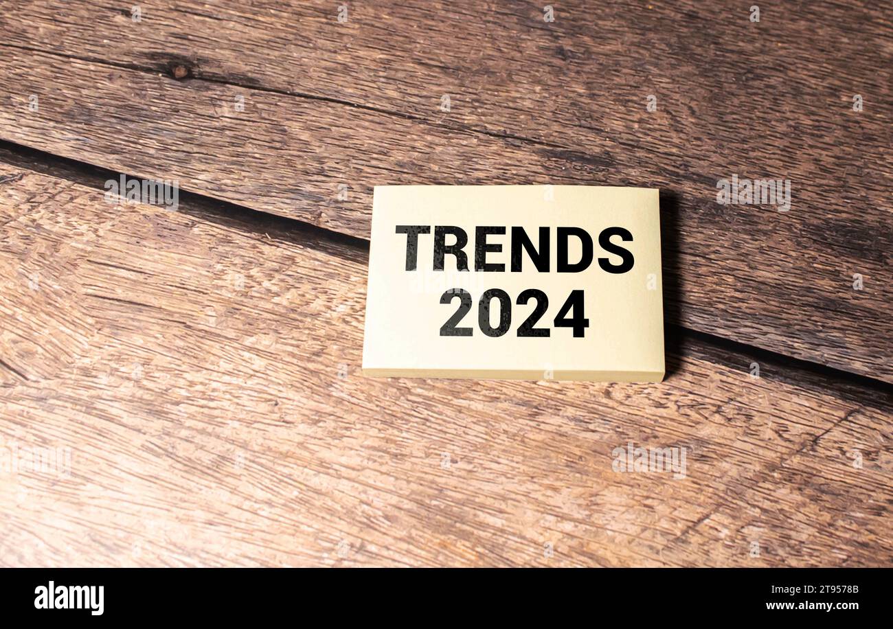 TRENDS 2024 text written on a notebook with chart Stock Photo - Alamy