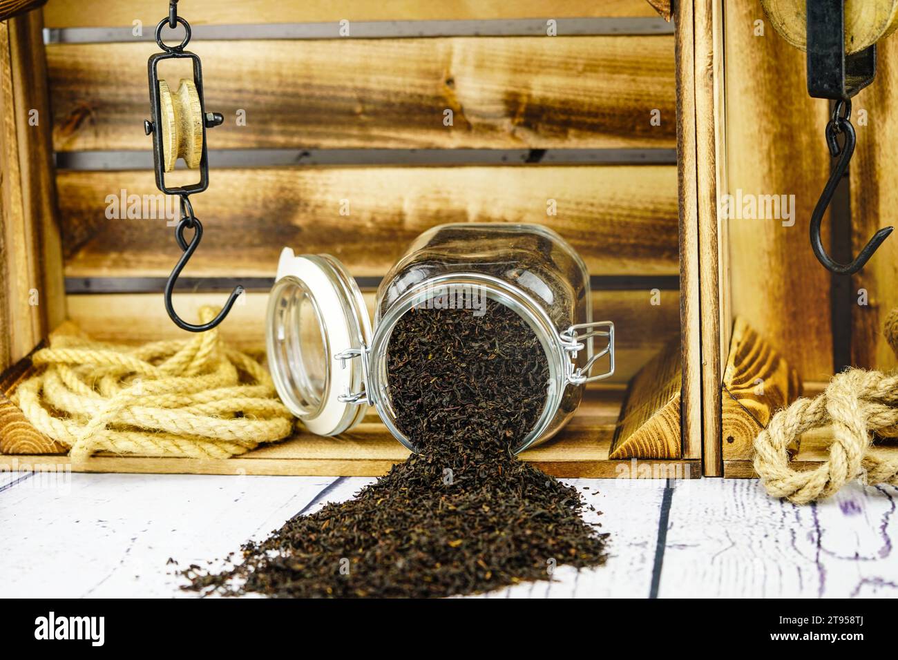 dry tea leaves in glass jar and rope Stock Photo - Alamy