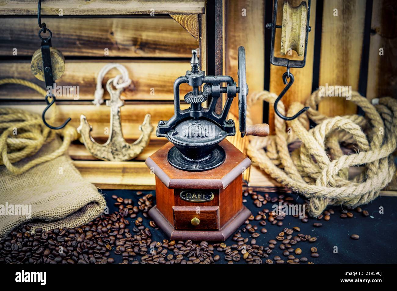 coffee mill, coffee beans, anchor, rope and sack Stock Photo - Alamy