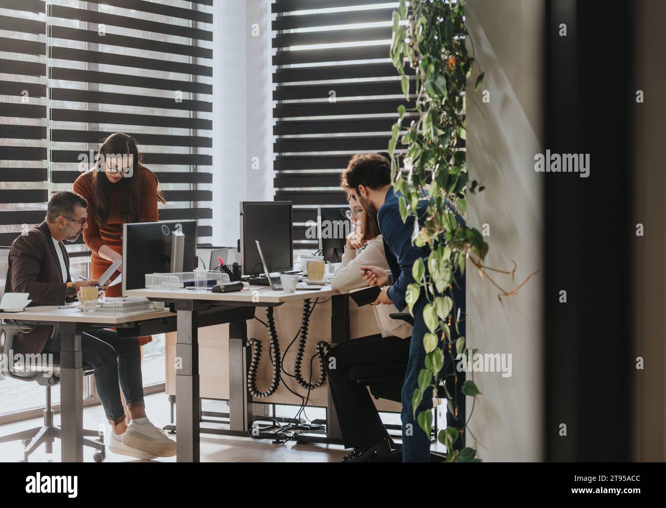 Successful Business Team Working Together Stock Photo - Alamy