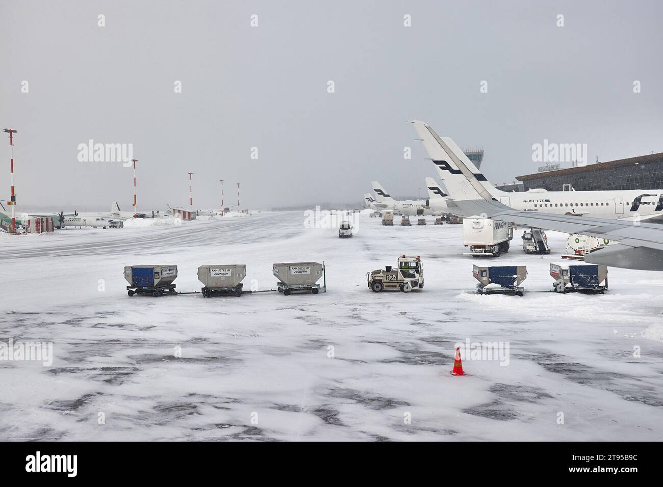 Winter airport operation with snow storm Stock Photo - Alamy