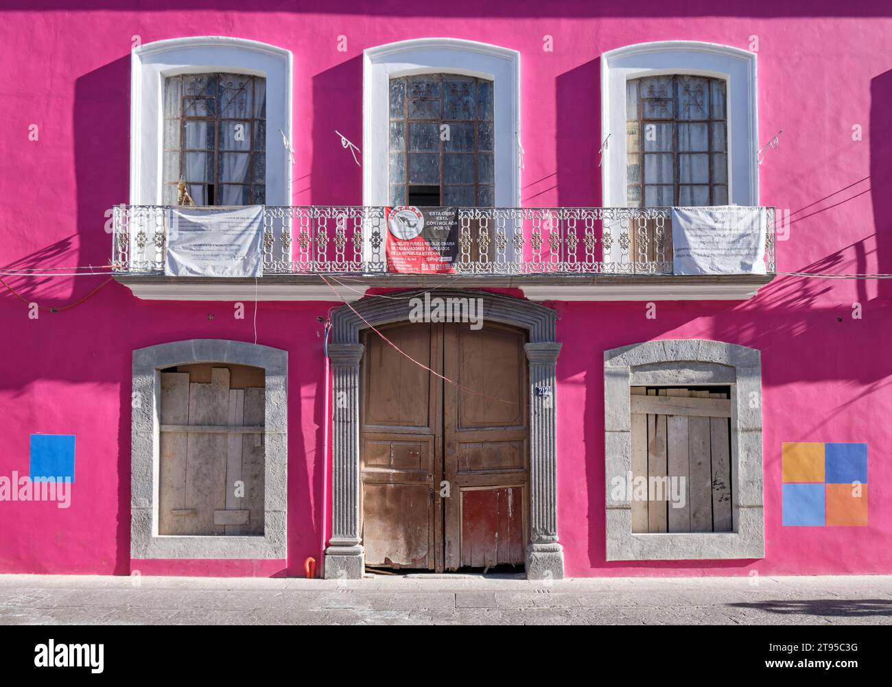 Facade of a pink residential building in Puebla, Mexico Stock Photo - Alamy