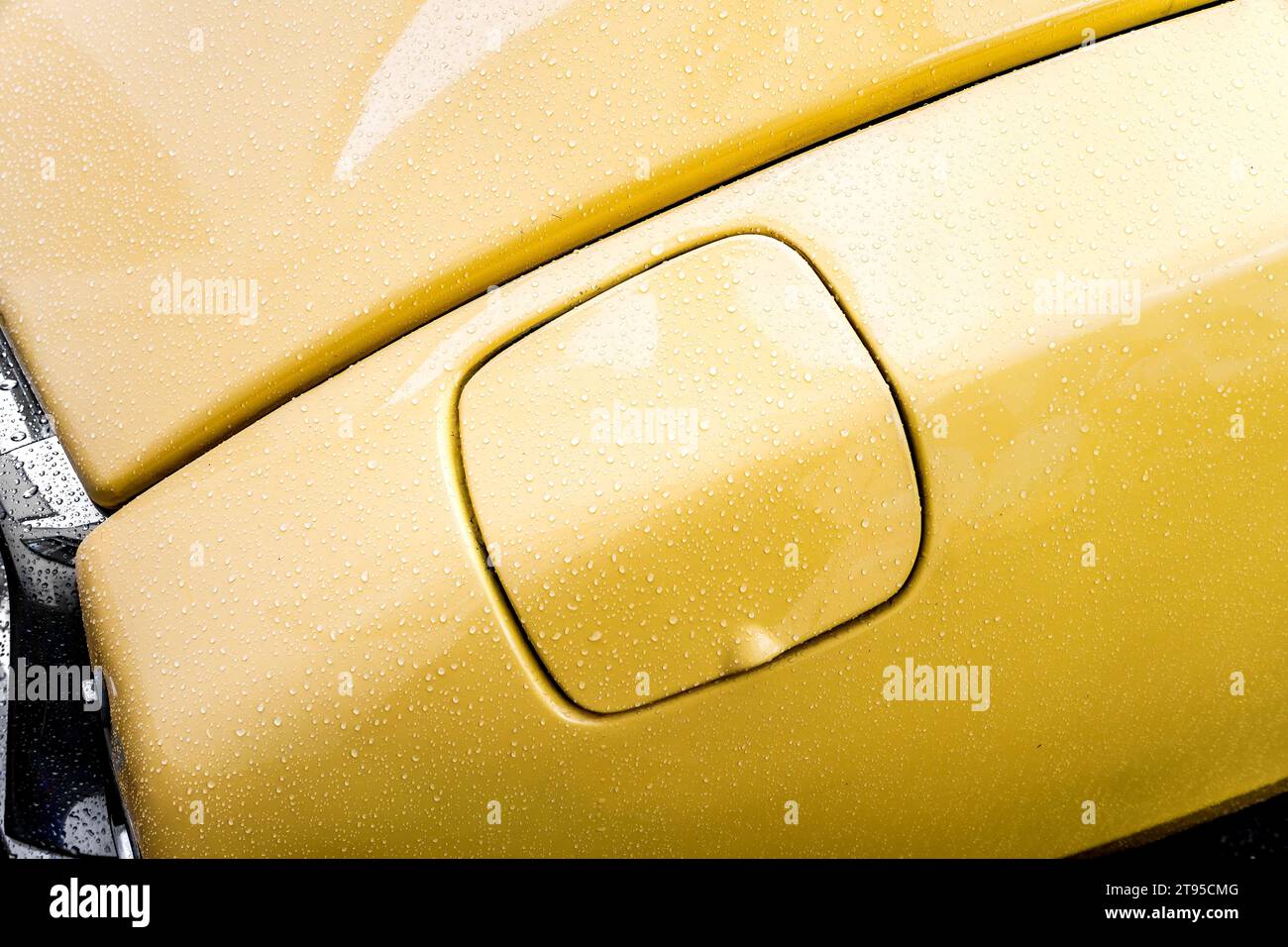 WETTENBERG, HESSE, GERMANY - 07 - 28 - 2023: Yellow Tank cap of Citroën ...