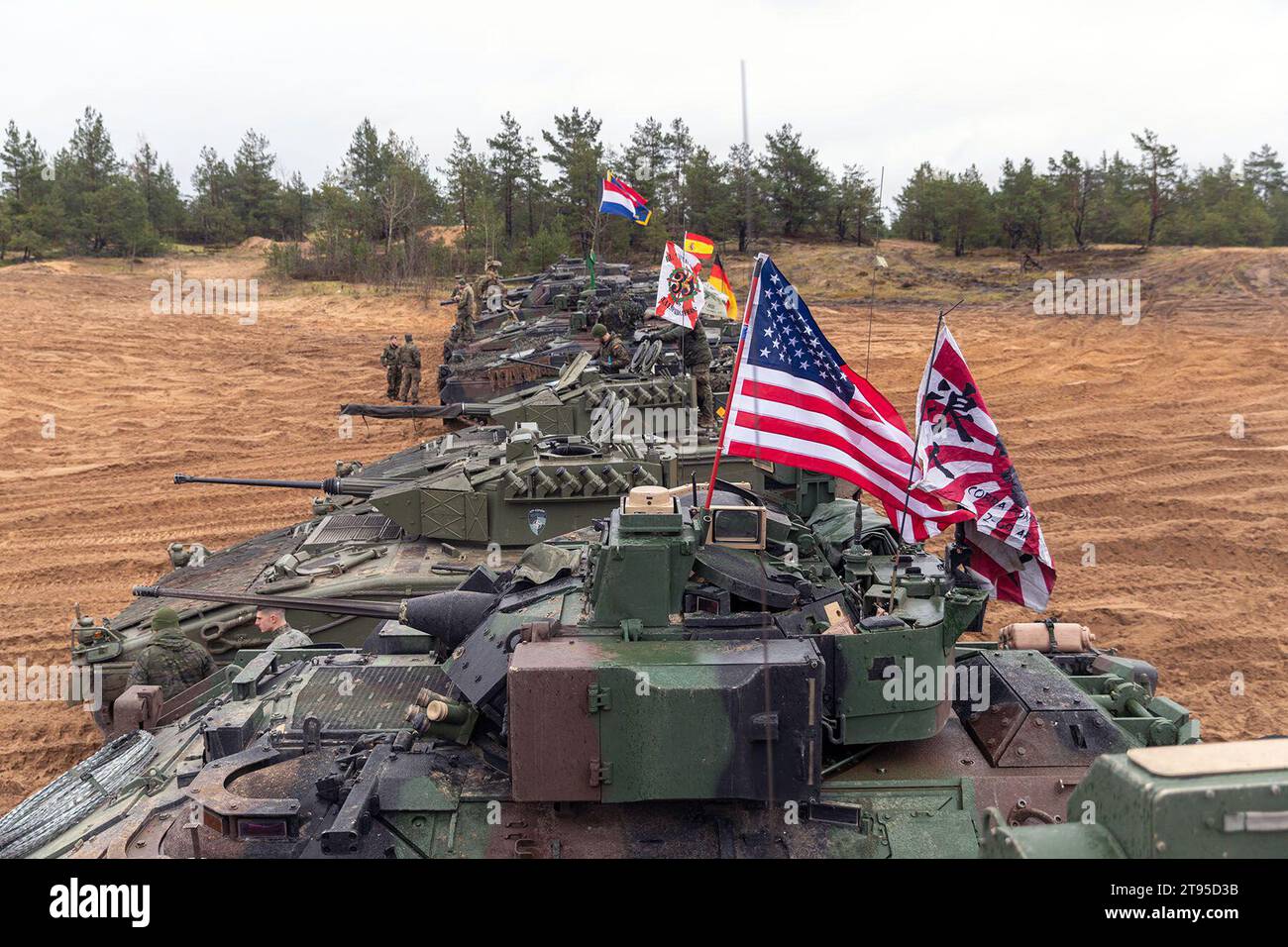 Adazi, Latvia. 13th Nov, 2023. Multinational troops representing ...