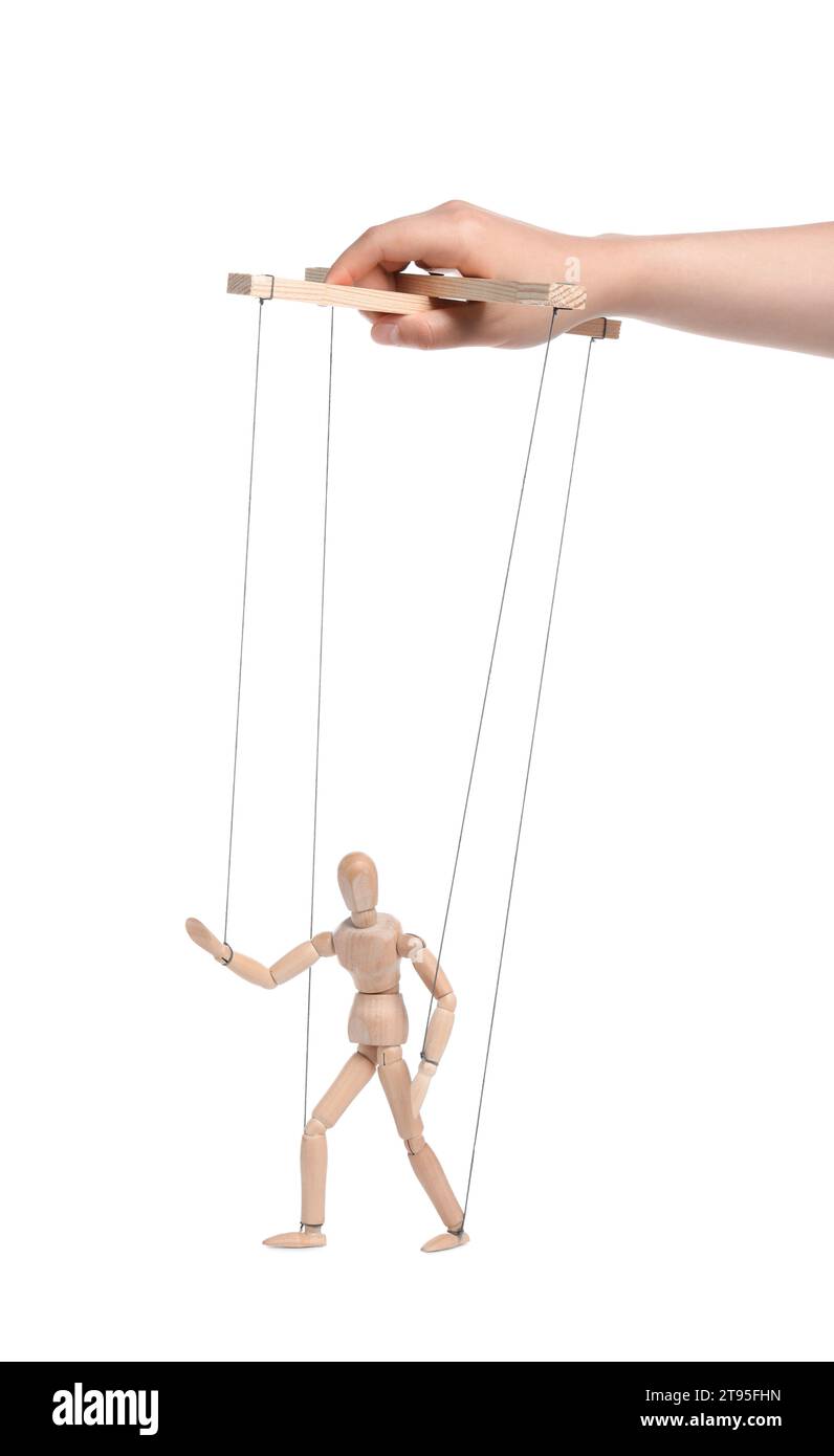 Woman pulling strings of puppet on white background, closeup Stock ...