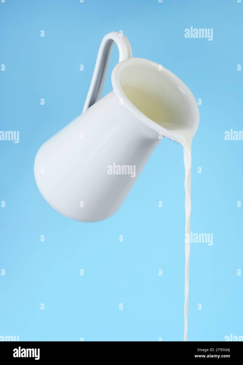 Pouring milk from jug hi-res stock photography and images - Alamy