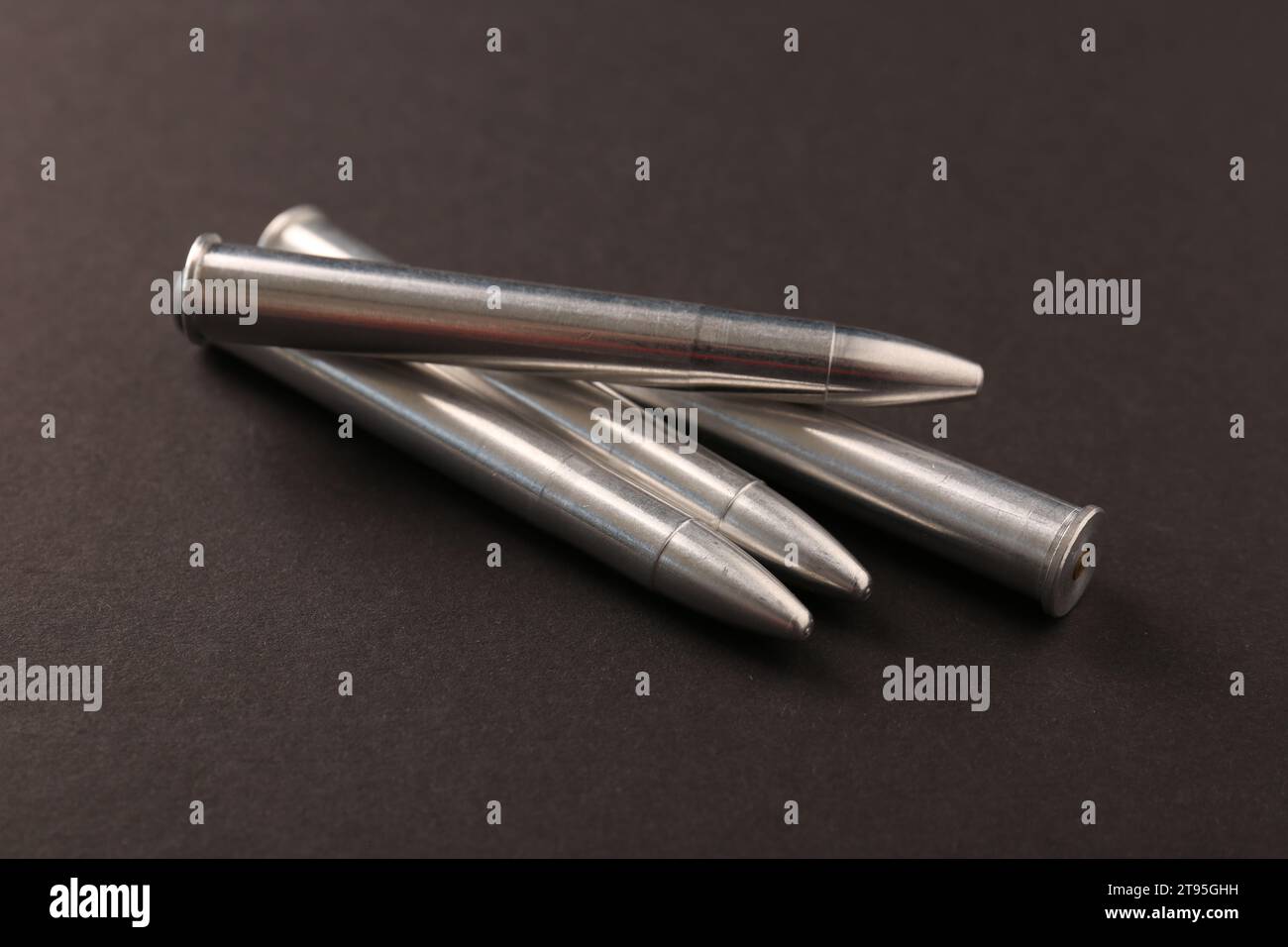 Many metal bullets on black background, closeup Stock Photo - Alamy
